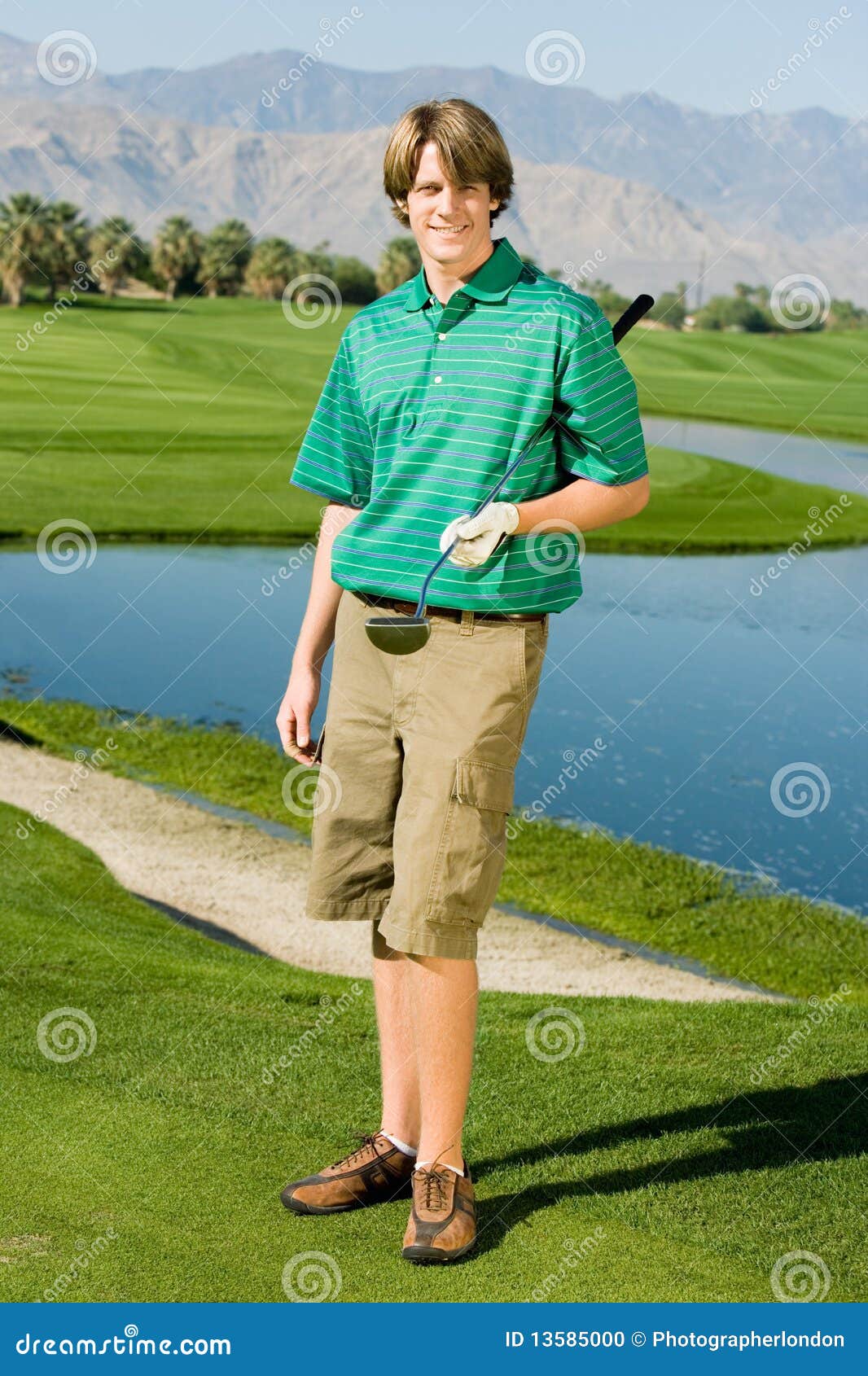 Golfer Standing on Golf Course Green Stock Photo - Image of full ...