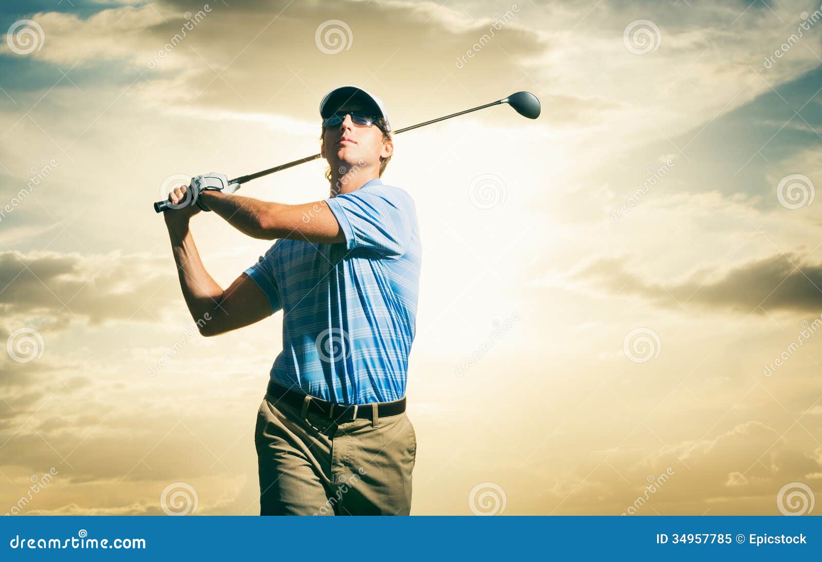 Golfer at sunset stock image. Image of play, golf, light - 34957785