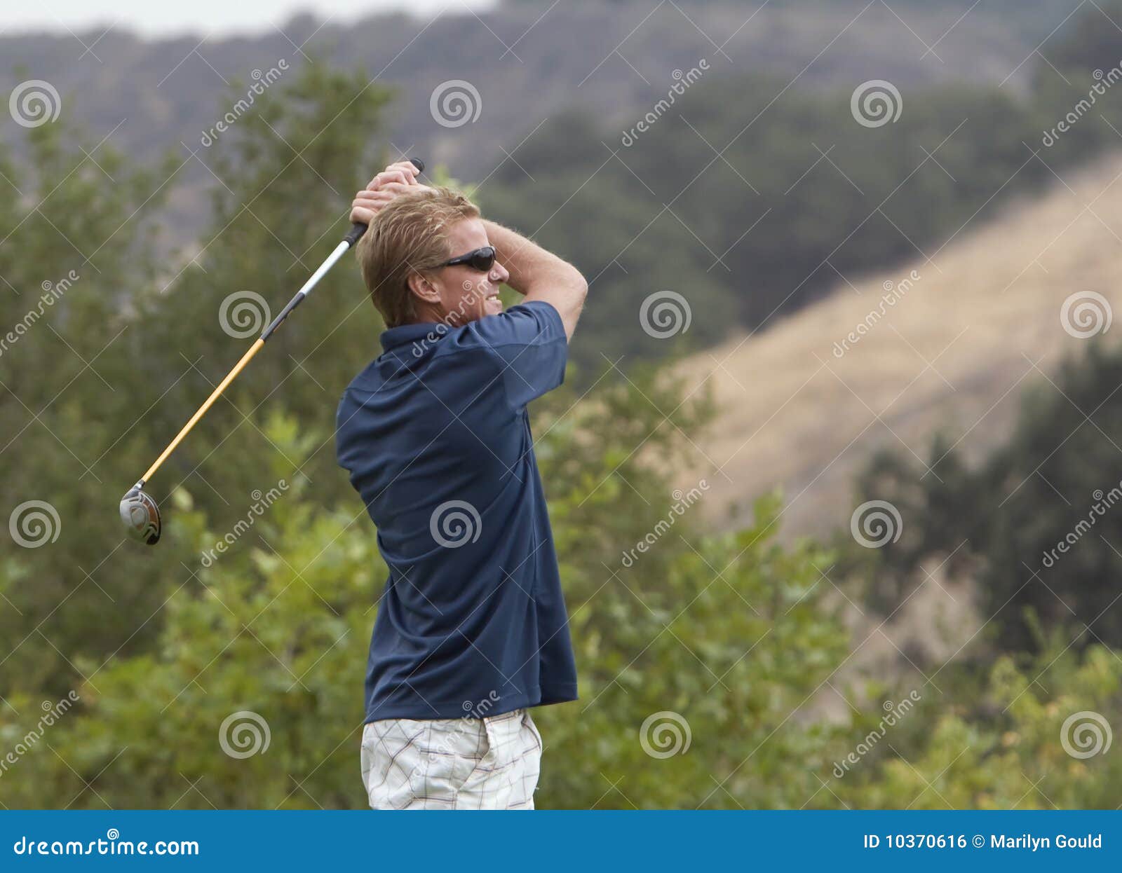 Golfer at Swing Finish stock photo. Image of golf, blue - 10370616