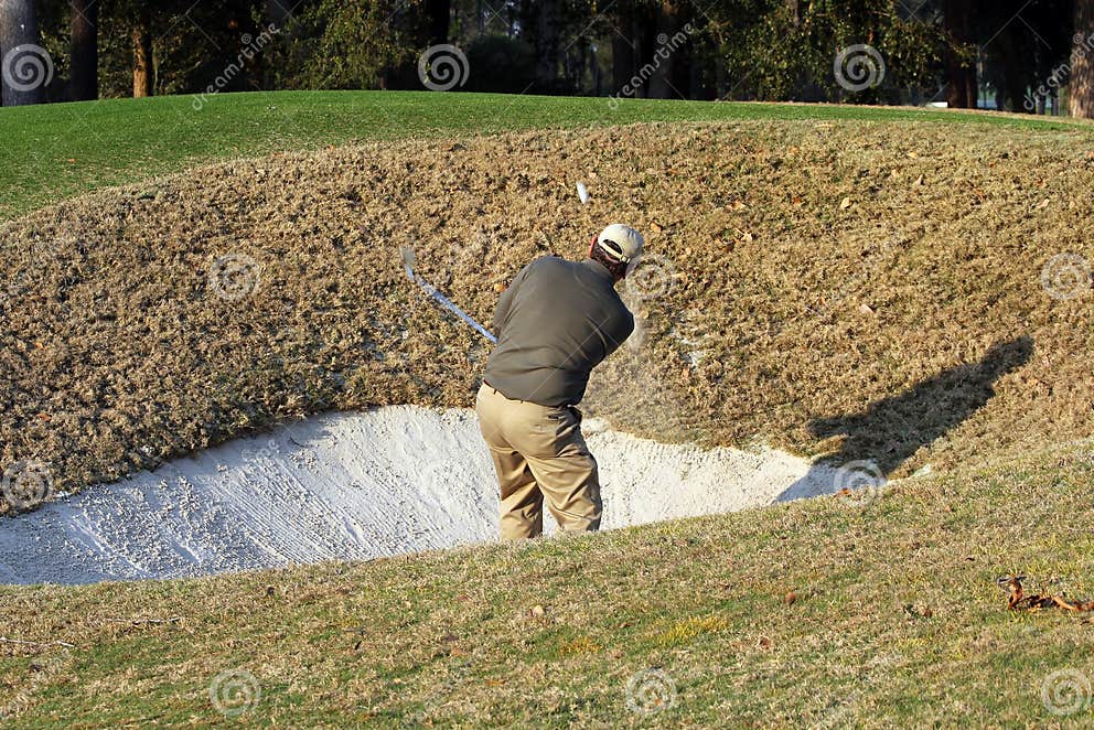 Golfer Takes Deep Bunker Shot. Stock Image - Image of golf, golfer ...