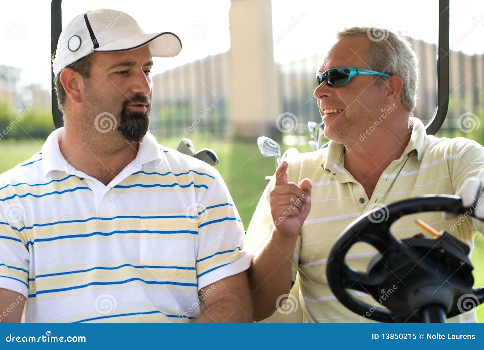 Golfers in cart stock image. Image of furious, clubs - 13850215