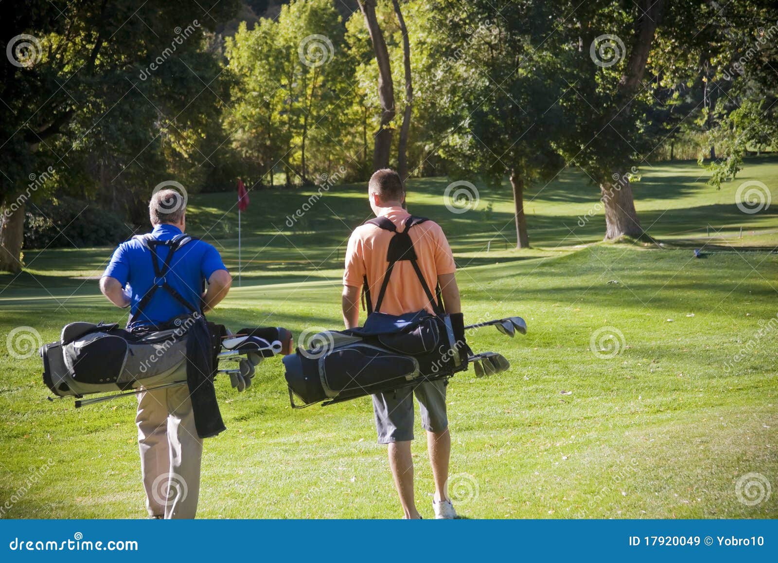 Golfers Walking on the Golf Course Stock Image - Image of picturesque ...