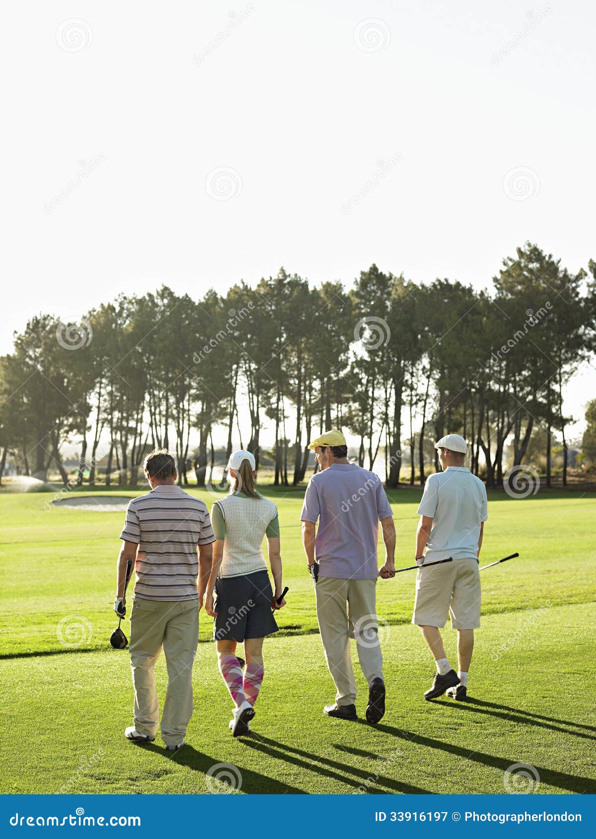 Golfers Walking on Golf Course Stock Image - Image of four, golf: 33916197