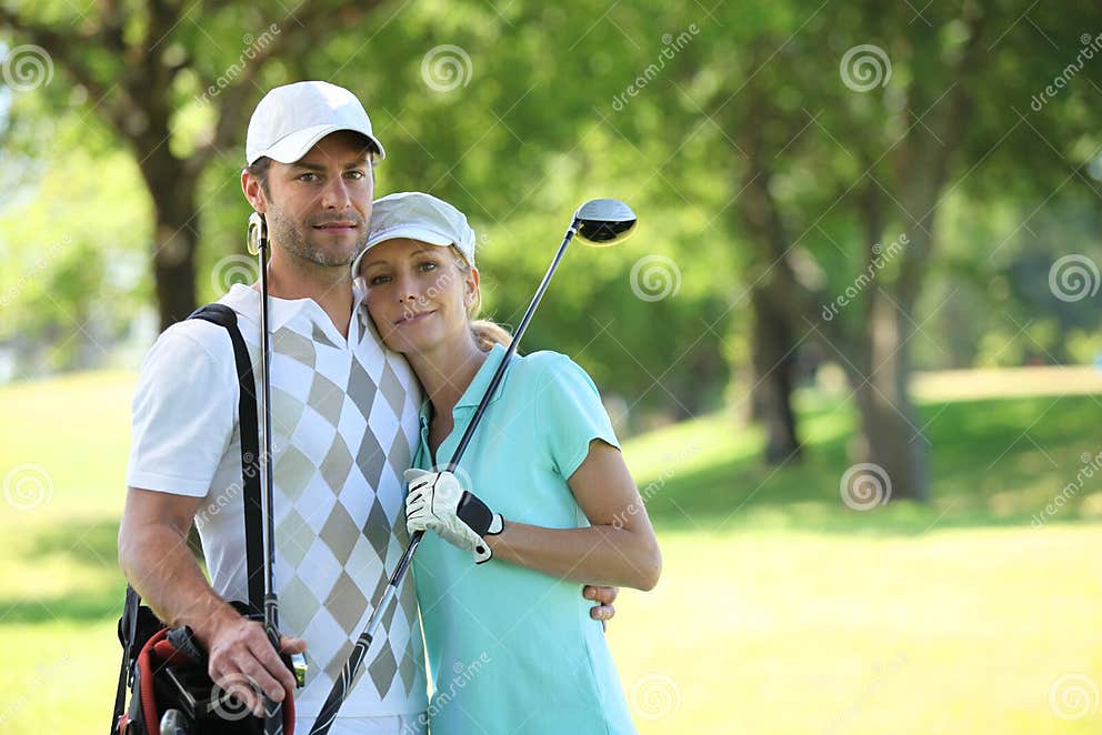 Golfing couple stock image. Image of loving, hugging - 28298915