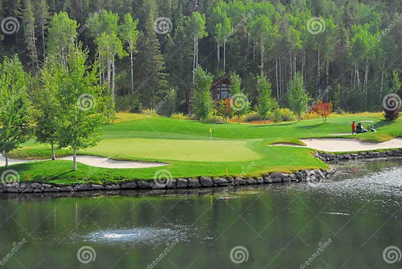 Golfing over the water stock image. Image of resort, outdoors - 11380547
