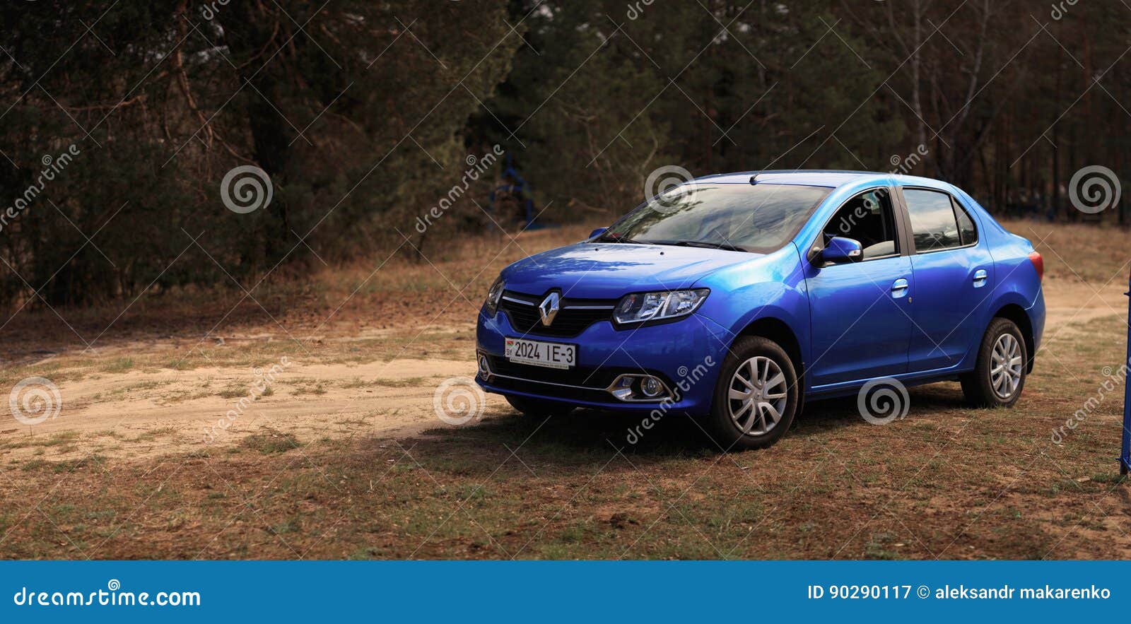 GOMEL, BELARUS - 8 April 2017: Car Renault Logan Blue Parked in a Pine ...