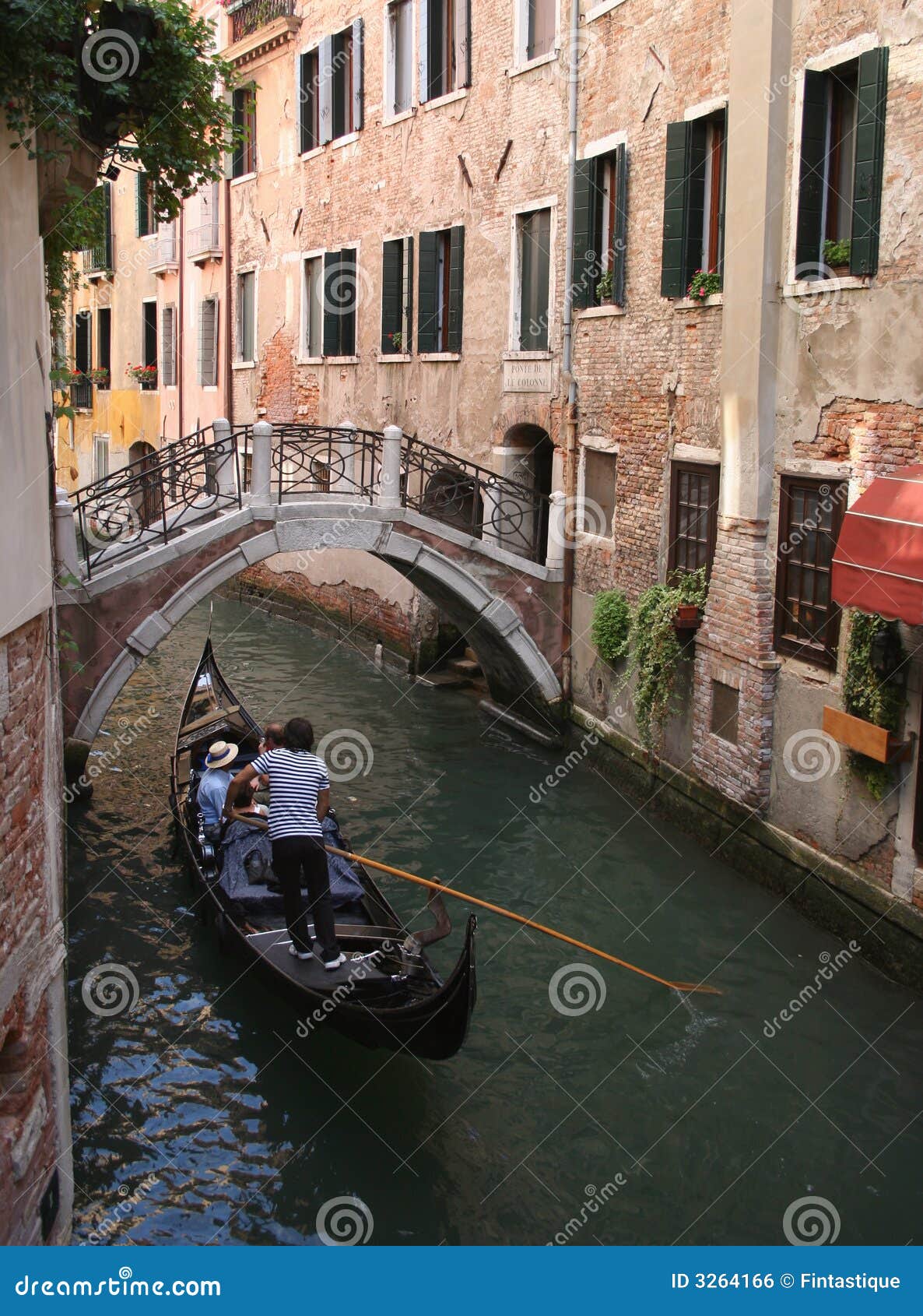 Gondola on narrow canal stock photo. Image of gondola - 3264166
