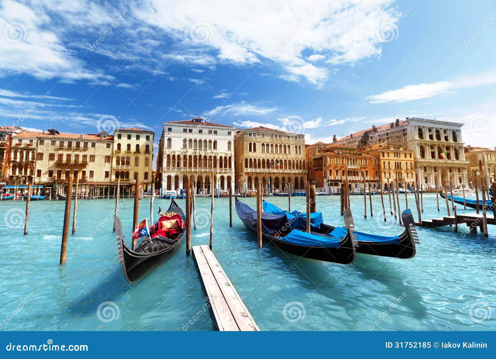 Gondolas On Canal And Basilica Santa Maria Della Salute Venice Stock
