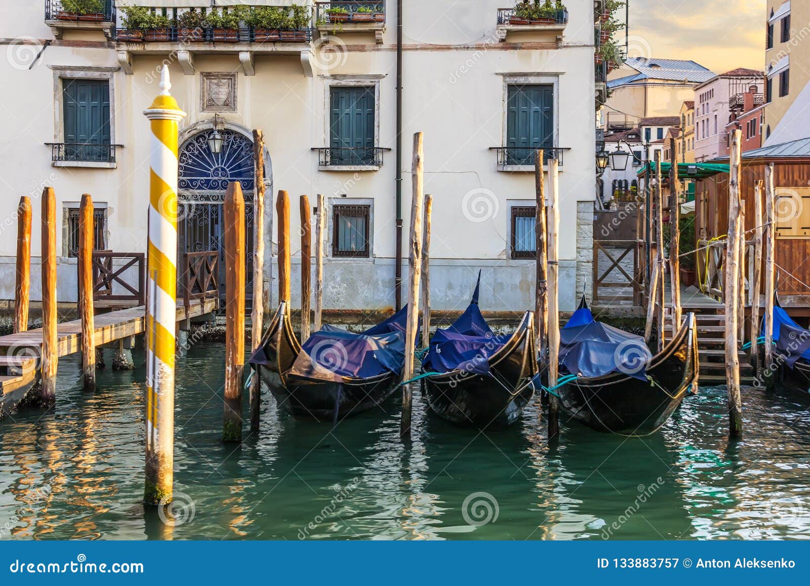 Gondolas, a Pier in Front of the Palace and a Typical Venetian B Stock ...