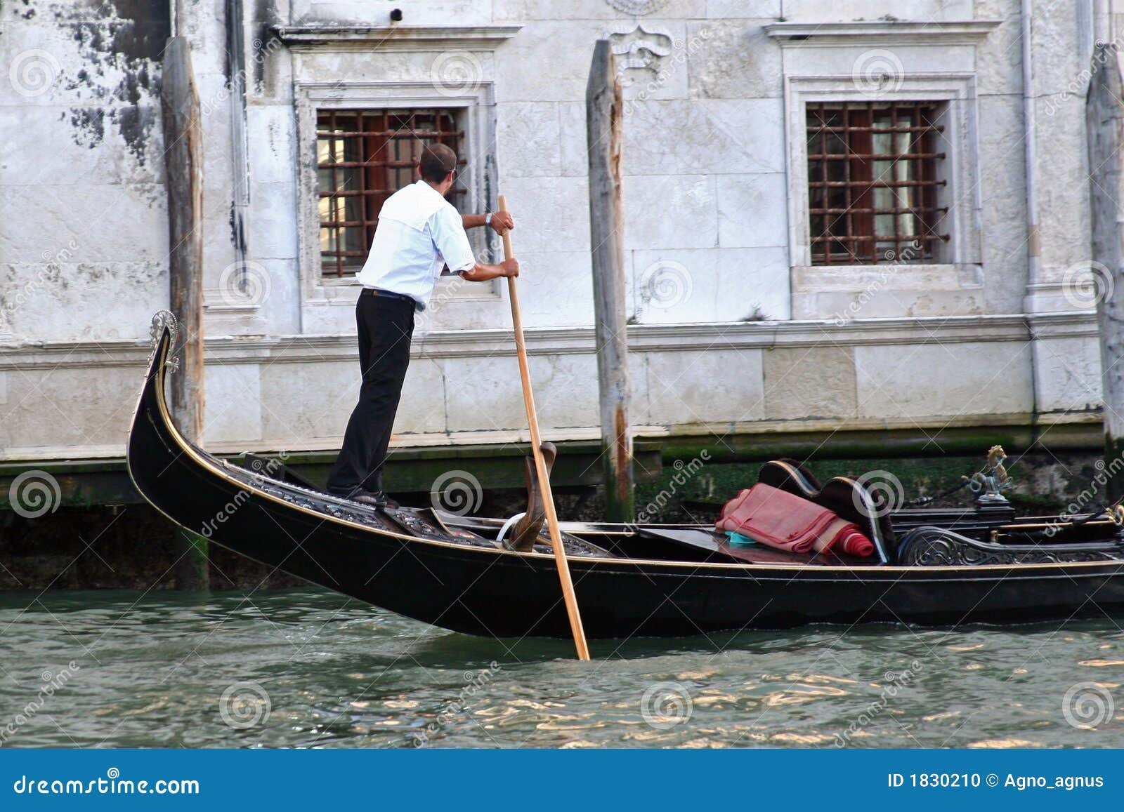 Gondolier rowing stock photo. Image of italia, historic - 1830210