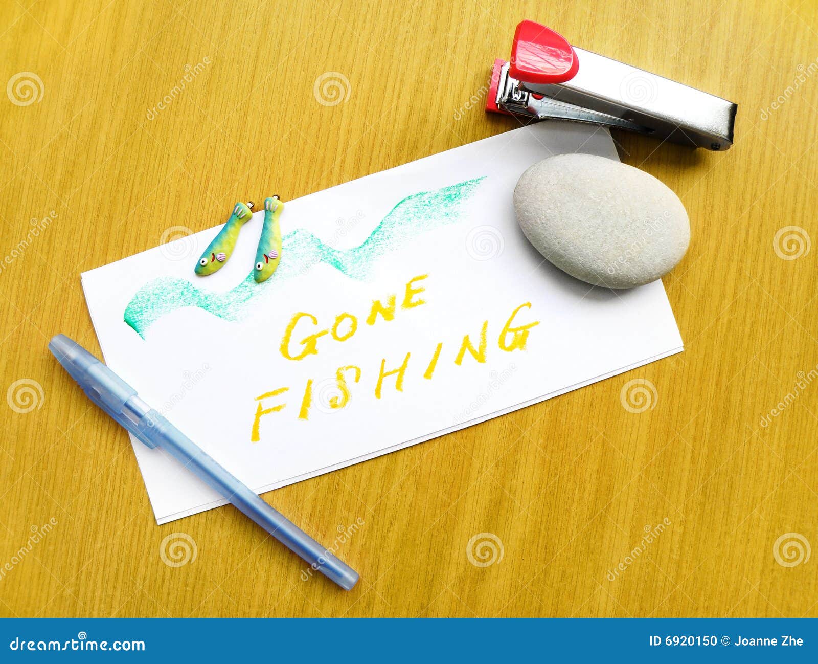 Gone Fishing note on desk stock photo. Image of fishing - 6920150