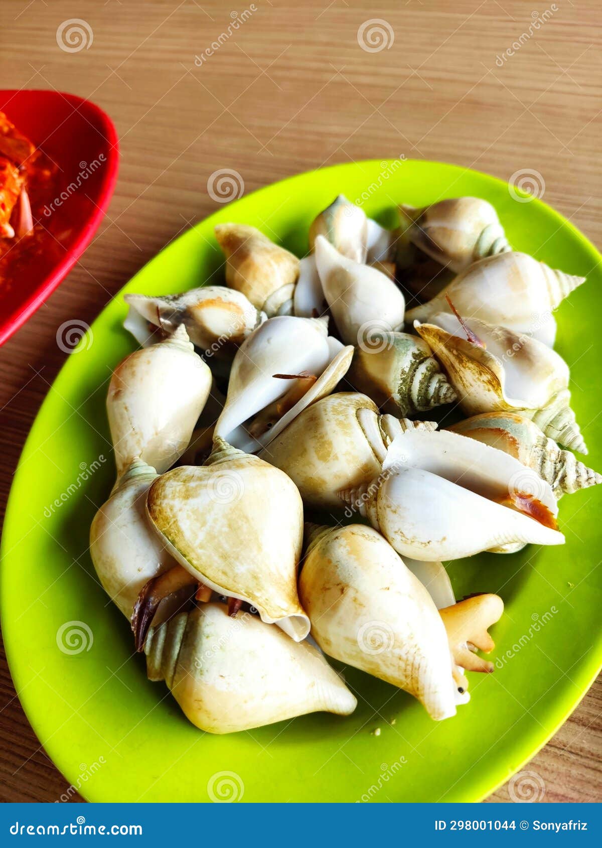 Gonggong Clams are a Typical Batam Food Stock Photo - Image of batam ...