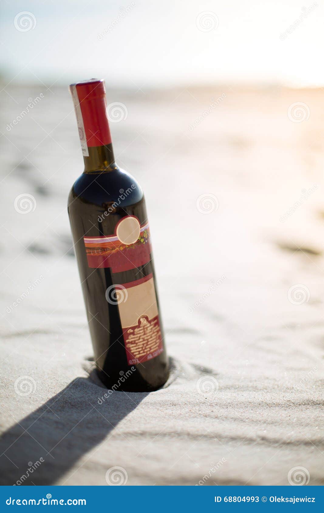 Good Bottle of Wine on the Beach in the Sun Stock Image - Image of ...