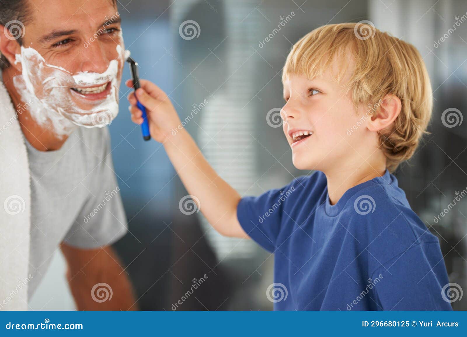 A Good Clean Shave. a Young Boy Shaving His Fathers Beard. Stock Image ...