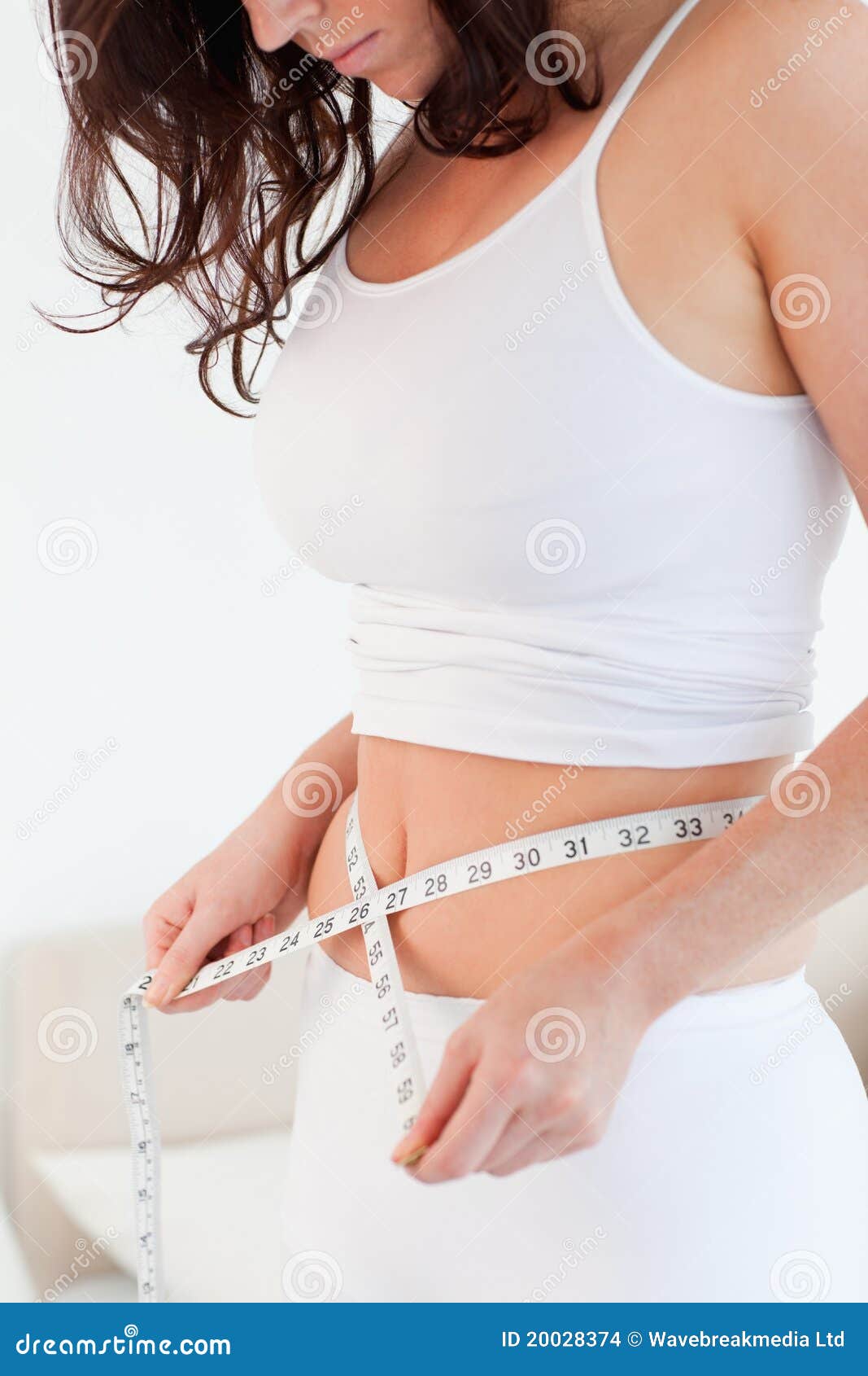 Good Looking Brunette Woman Measuring Her Belly Stock Photo - Image of ... Good Looking Brunette Woman Measuring Her Belly Stock Photo - Image of ...