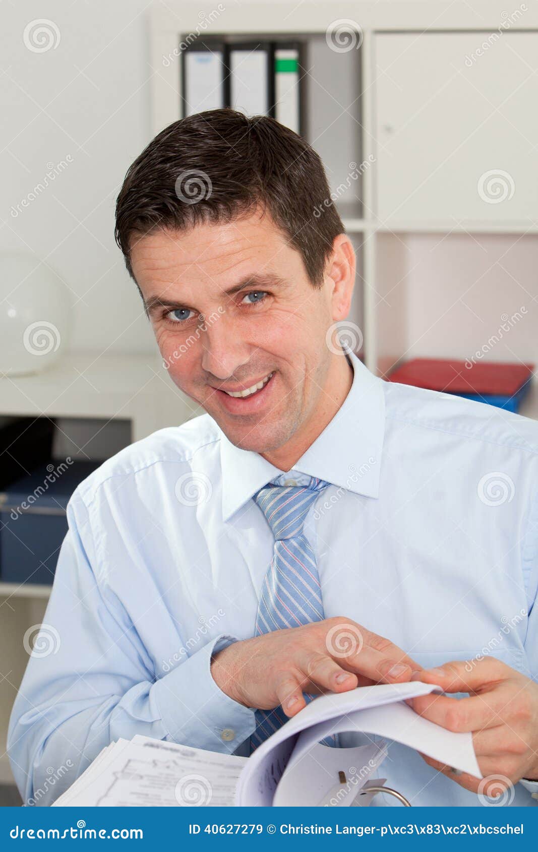 Good looking businessman stock image. Image of binder - 40627279