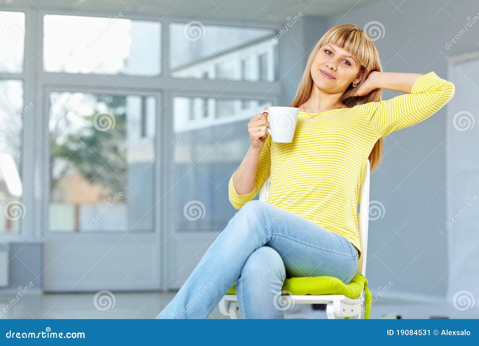 Good Looking Girl Sitting on Chair Stock Image - Image of blond, pretty ...