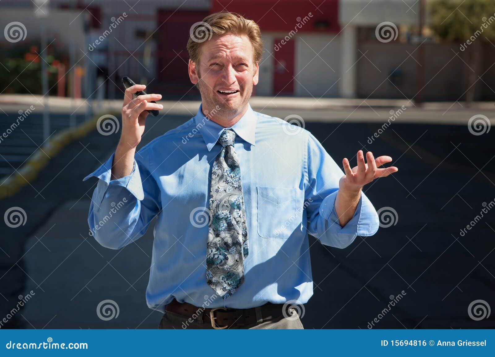 Good-looking Guy Frustrated with Cell Phone. Stock Photo - Image of ...