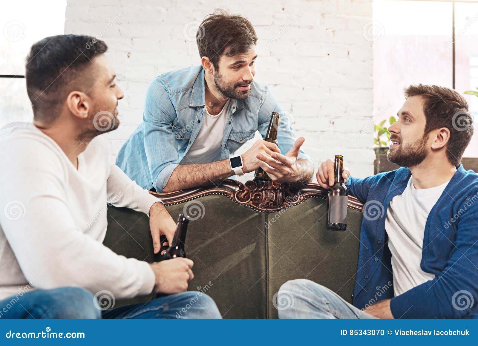 Good Looking Joyful Friends Having a Conversation Stock Photo - Image ...