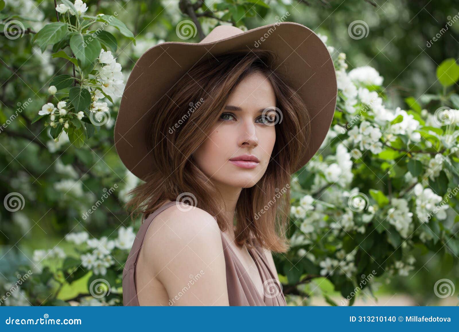 Good-looking Lady Female Model in Spring Leaves Background Stock Photo ...