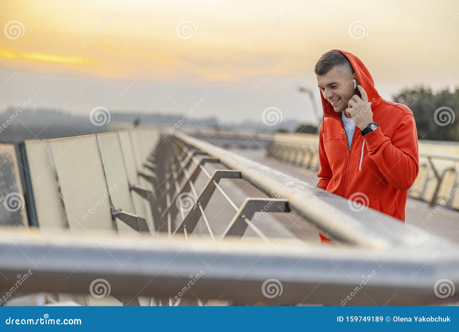 Good-looking Man Looking Down from a Bridge Stock Image - Image of ...