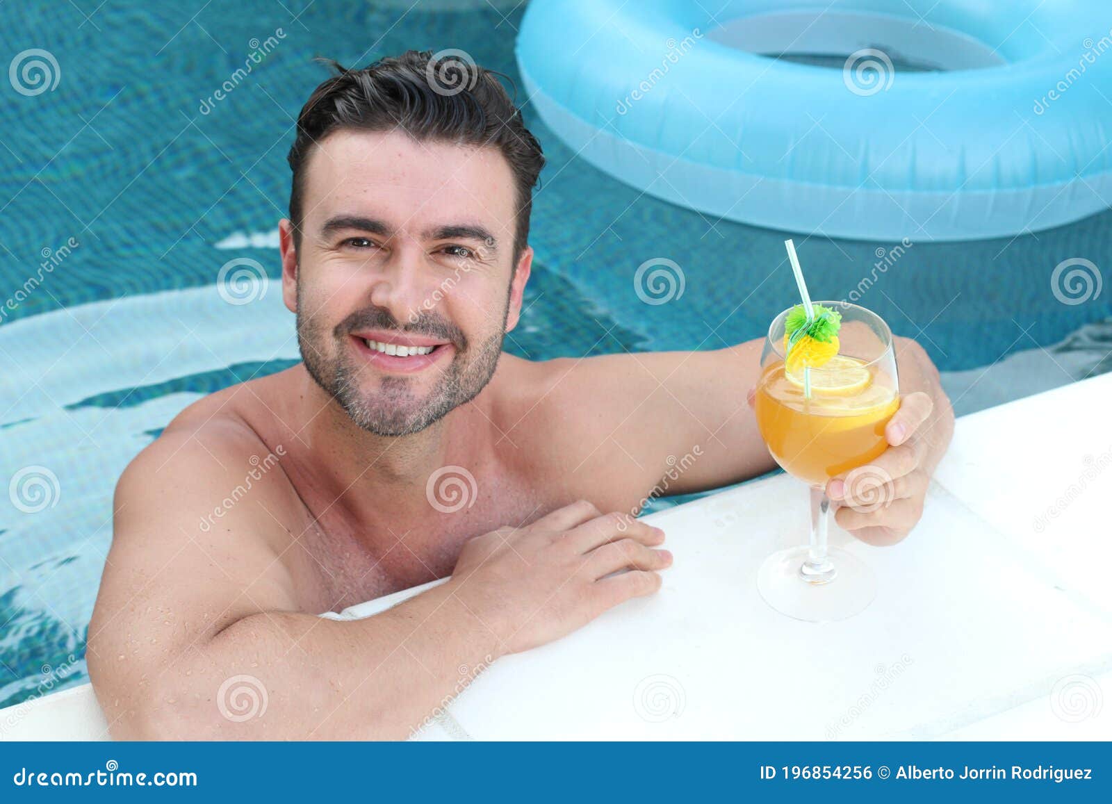 Good Looking Man Drinking Cocktail in Swimming Pool Stock Photo - Image ...
