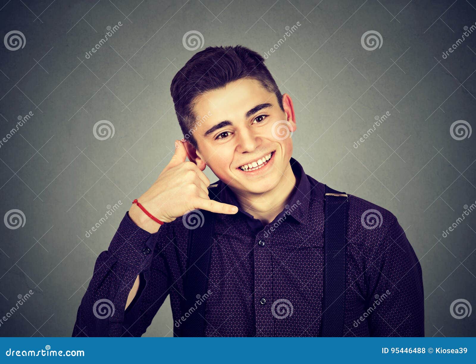 Good Looking Man Making a Gesture Call Me with His Fingers Stock Photo ...