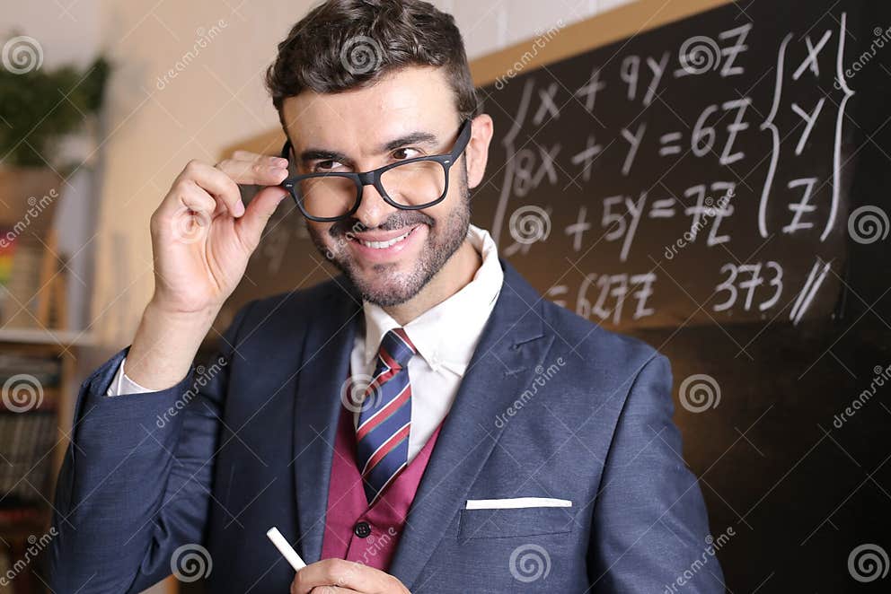 Good Looking Teacher in School Uniform Stock Photo - Image of ...