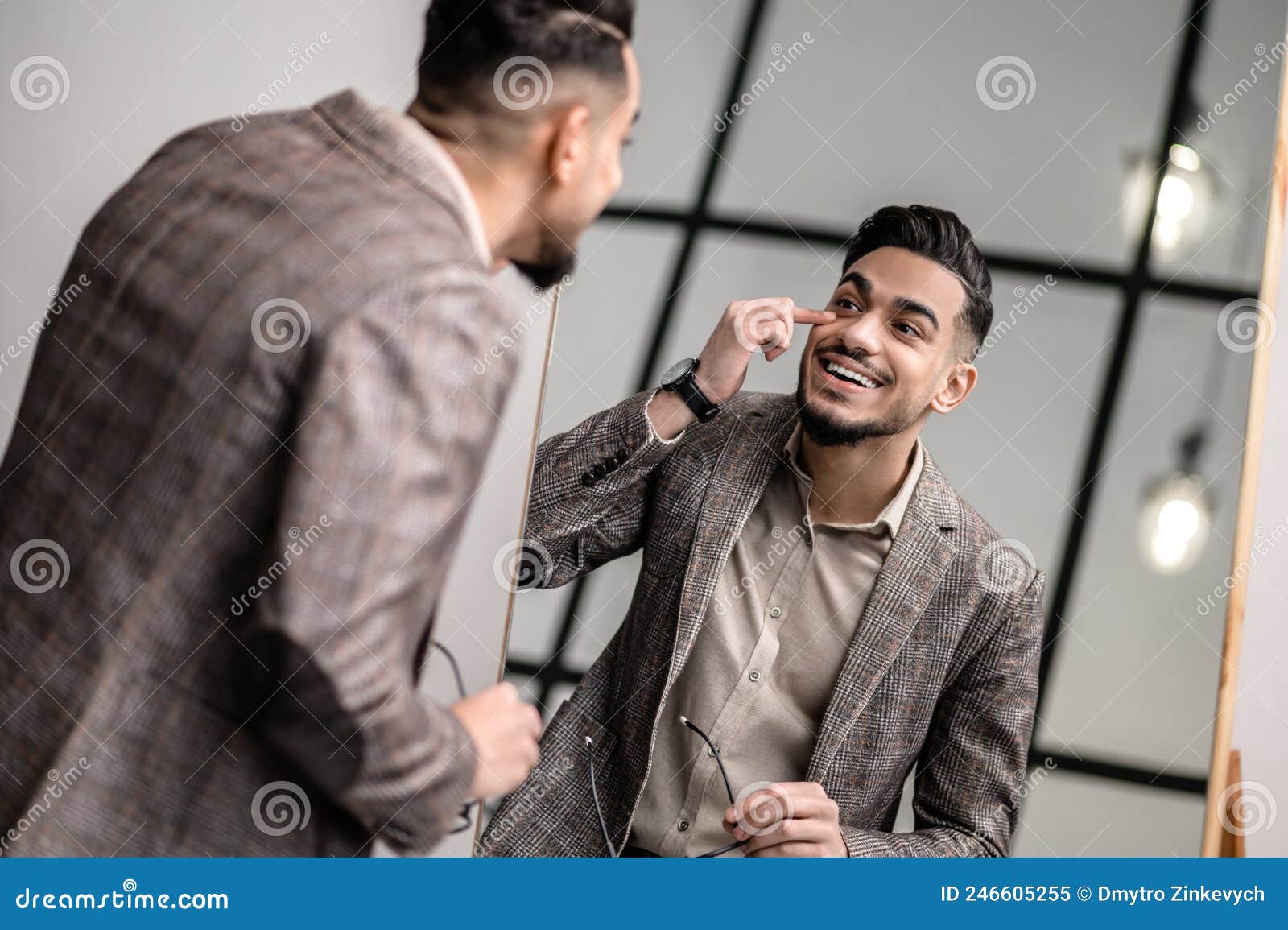 A Good-looking Young Elegant Man at the Mirror Stock Image - Image of ...