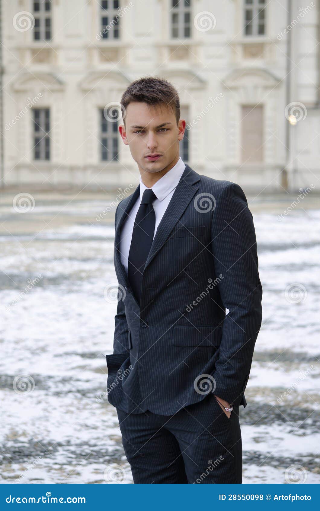 Good Looking Young Man and Elegant Palace with Snow Stock Photo - Image ...
