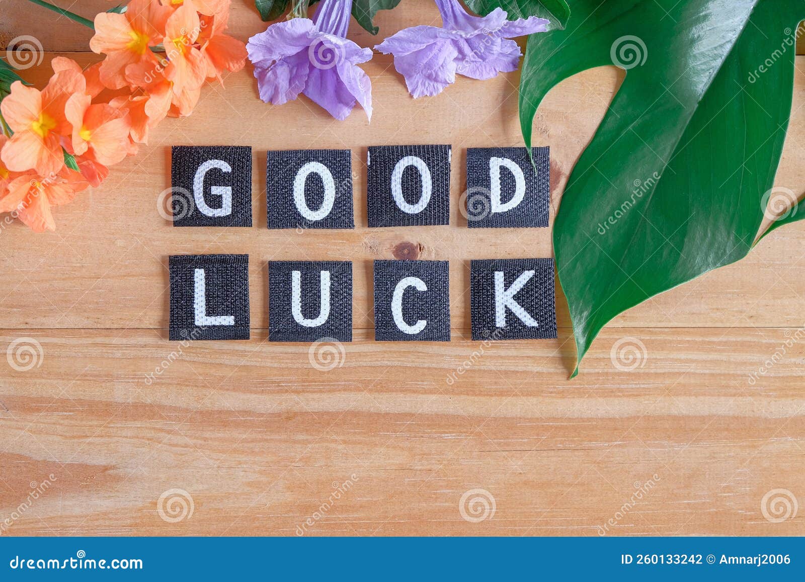 Good Luck Tag with Flower on Table Stock Photo - Image of symbols ...