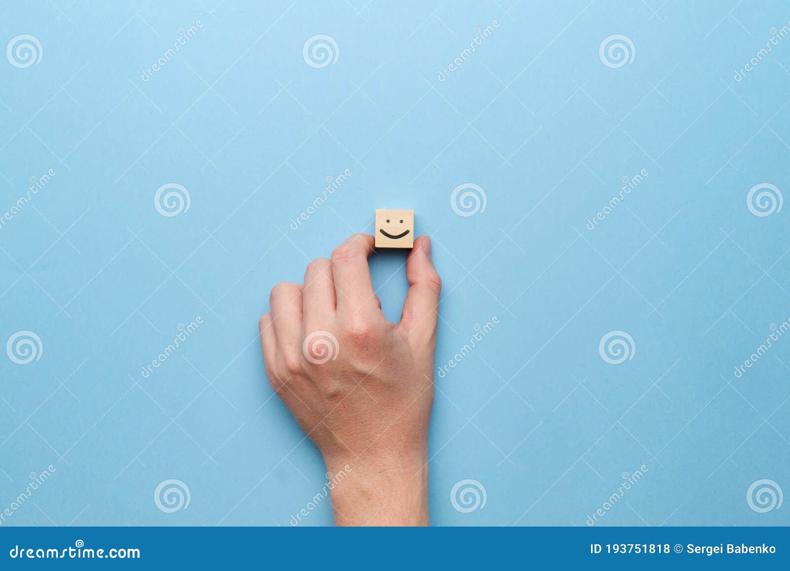Good Mood Smiley Concept on a Wooden Cube with a Hand Stock Photo ...