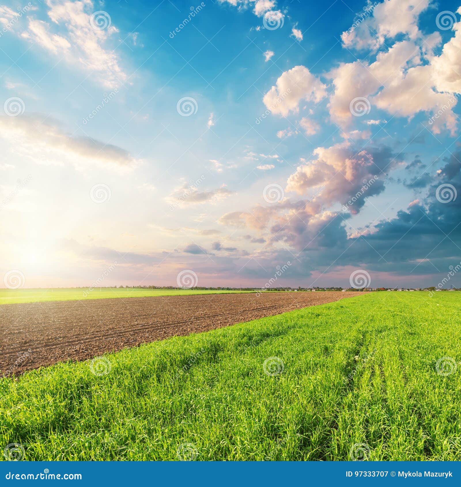 Good Sunset in Clouds Over Green Field Stock Image - Image of ...