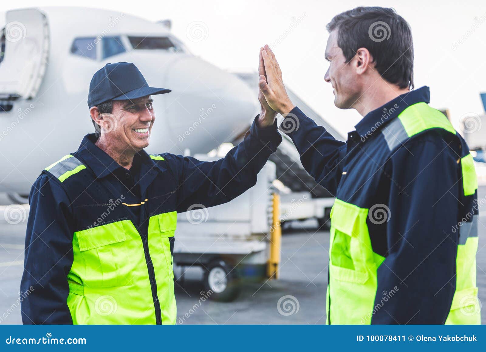 Happy Engineers Clapping Arms at Airdrome Stock Image - Image of ...