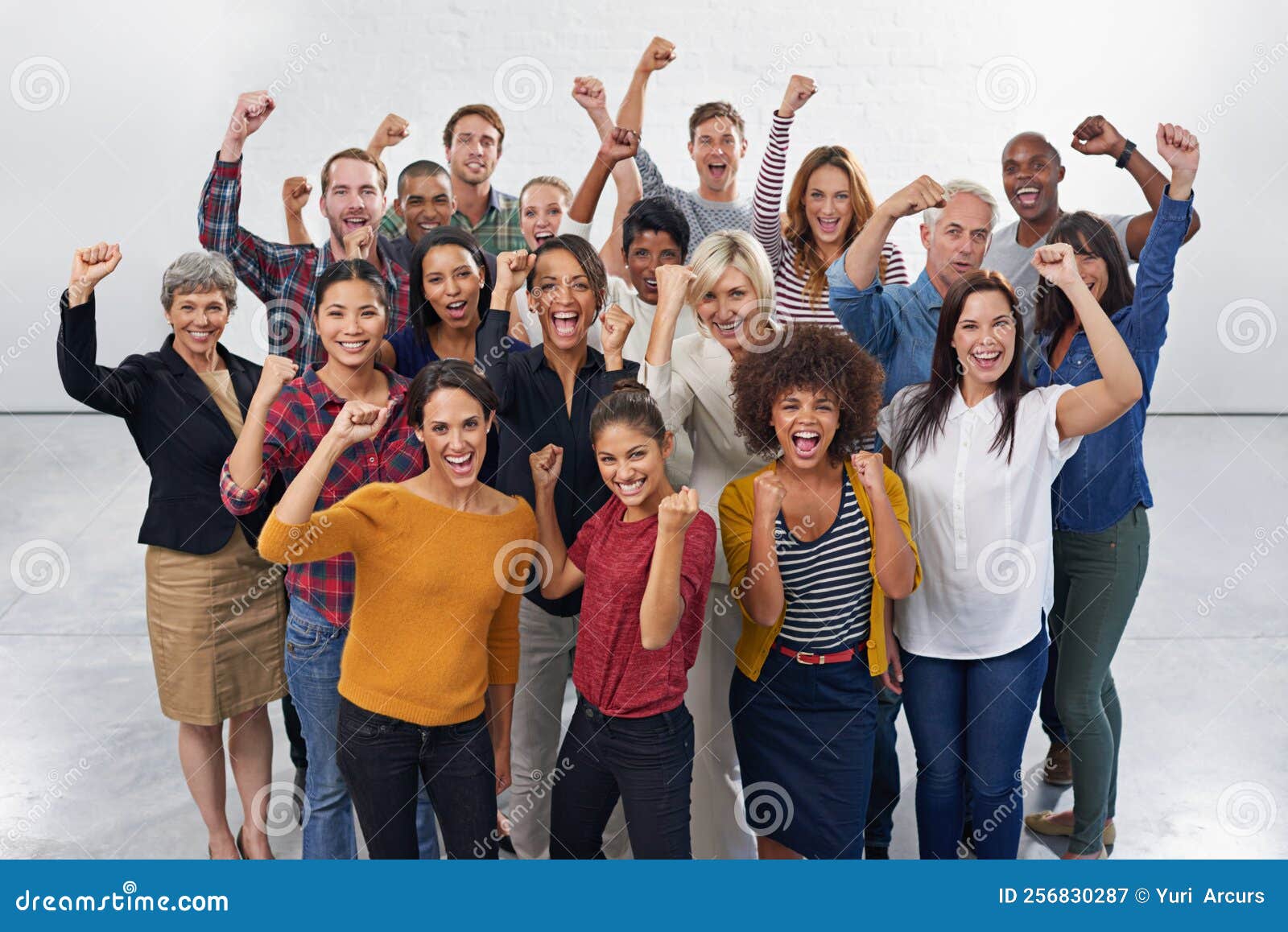 Good Teams.become Great Winners. a Group of Colleagues Punching the Air ...