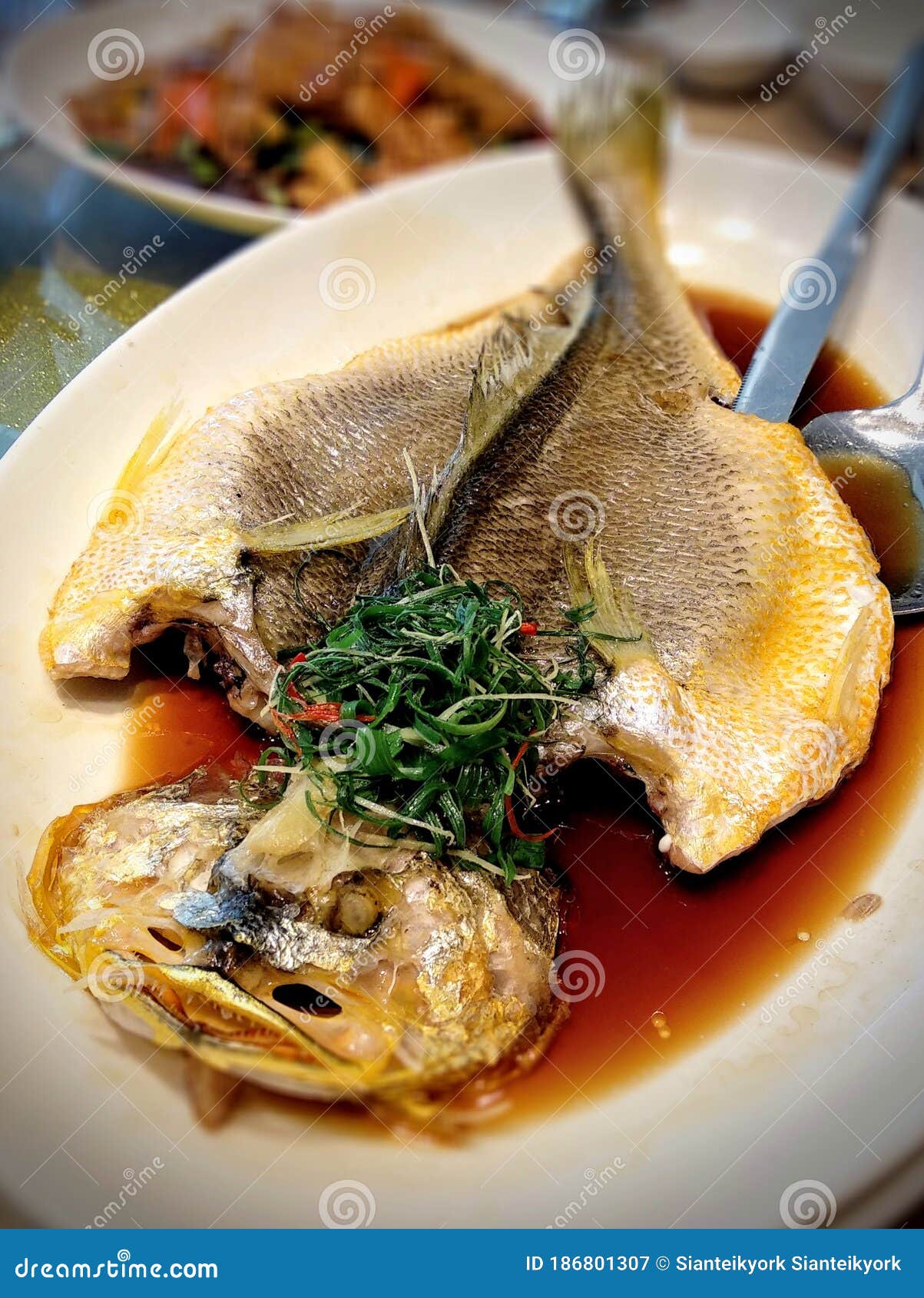 Steam yellow fish stock image. Image of meat, vegetable - 186801307