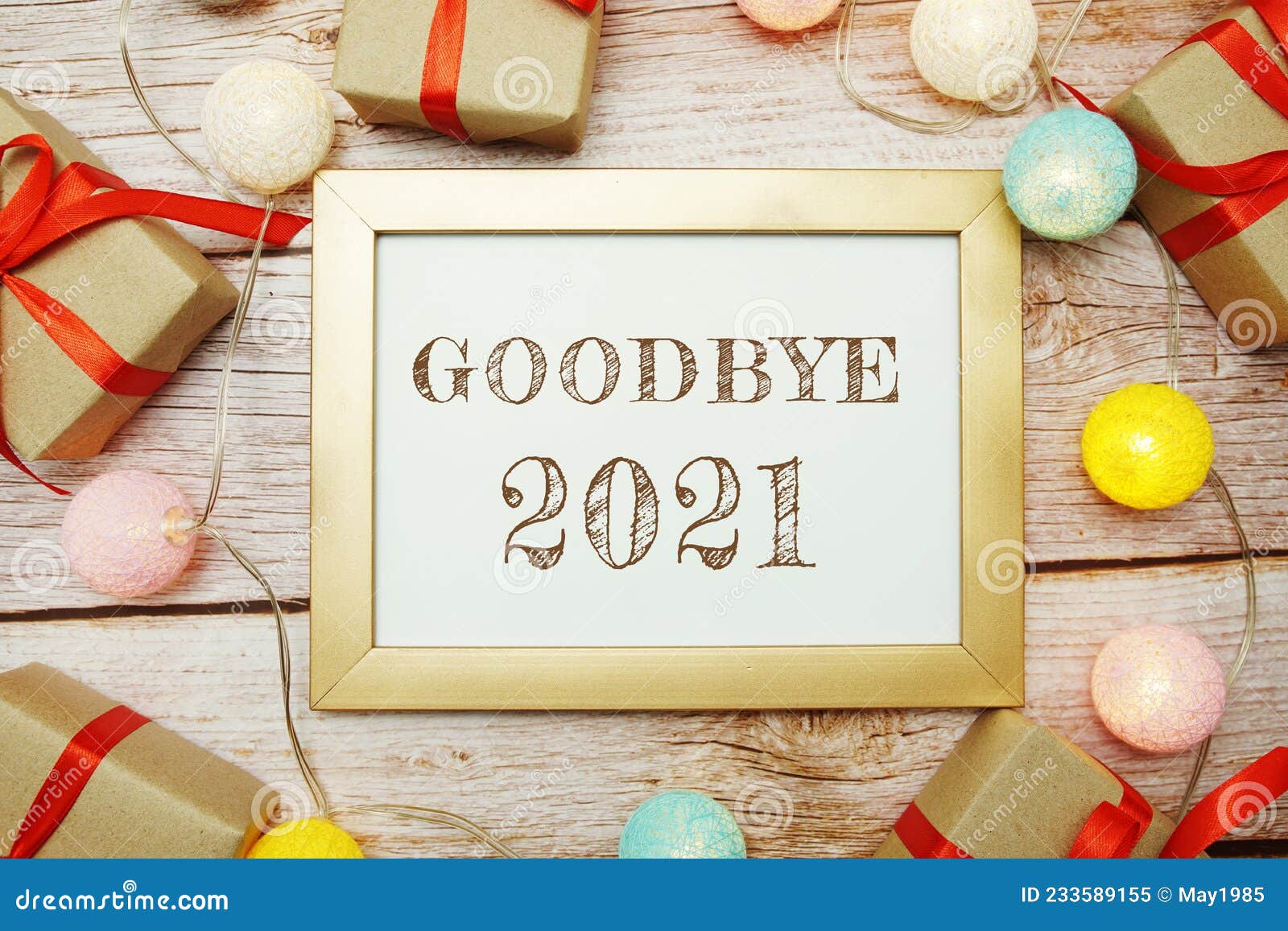 Goodbye 2021 Typography Text with LED Cotton Ball on Wooden Background ...