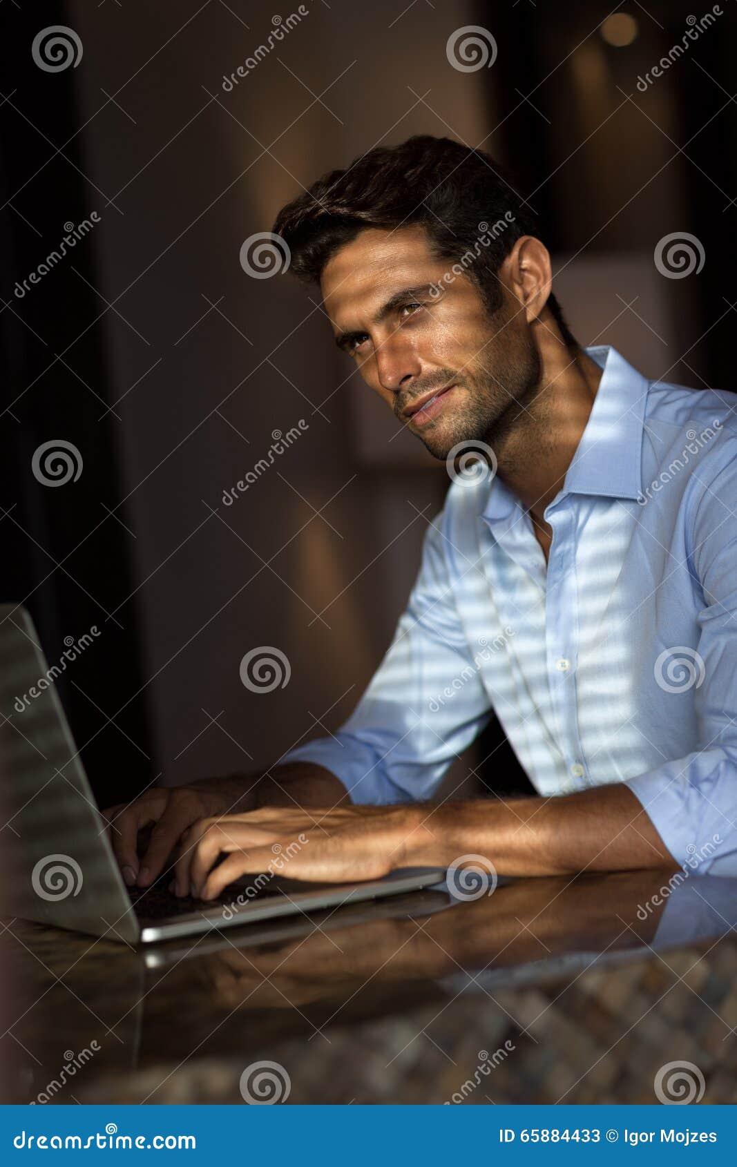 Goodlooking Young Man with Laptop Computer Stock Image - Image of ...