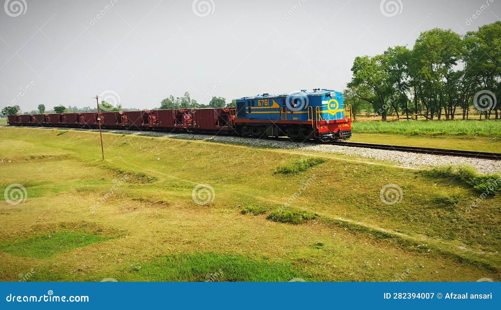 A Goods Train in a Village with Buetifull Wether Editorial Photography ...