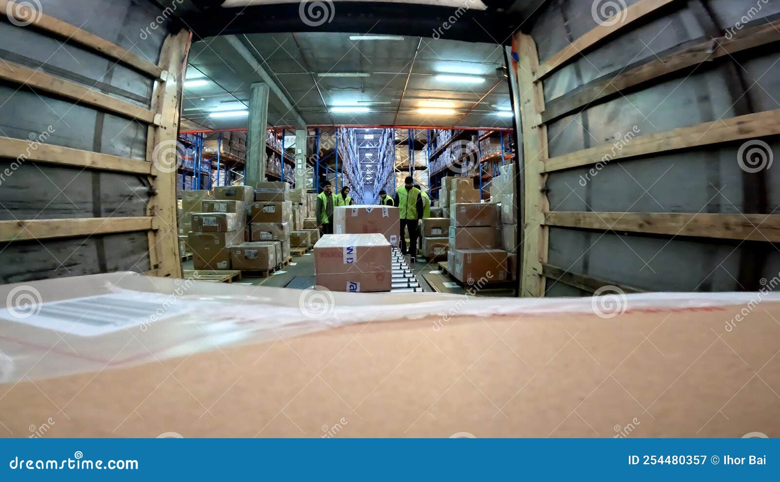 Goods are Unloaded from the Truck. the Process of Unloading Goods from ...
