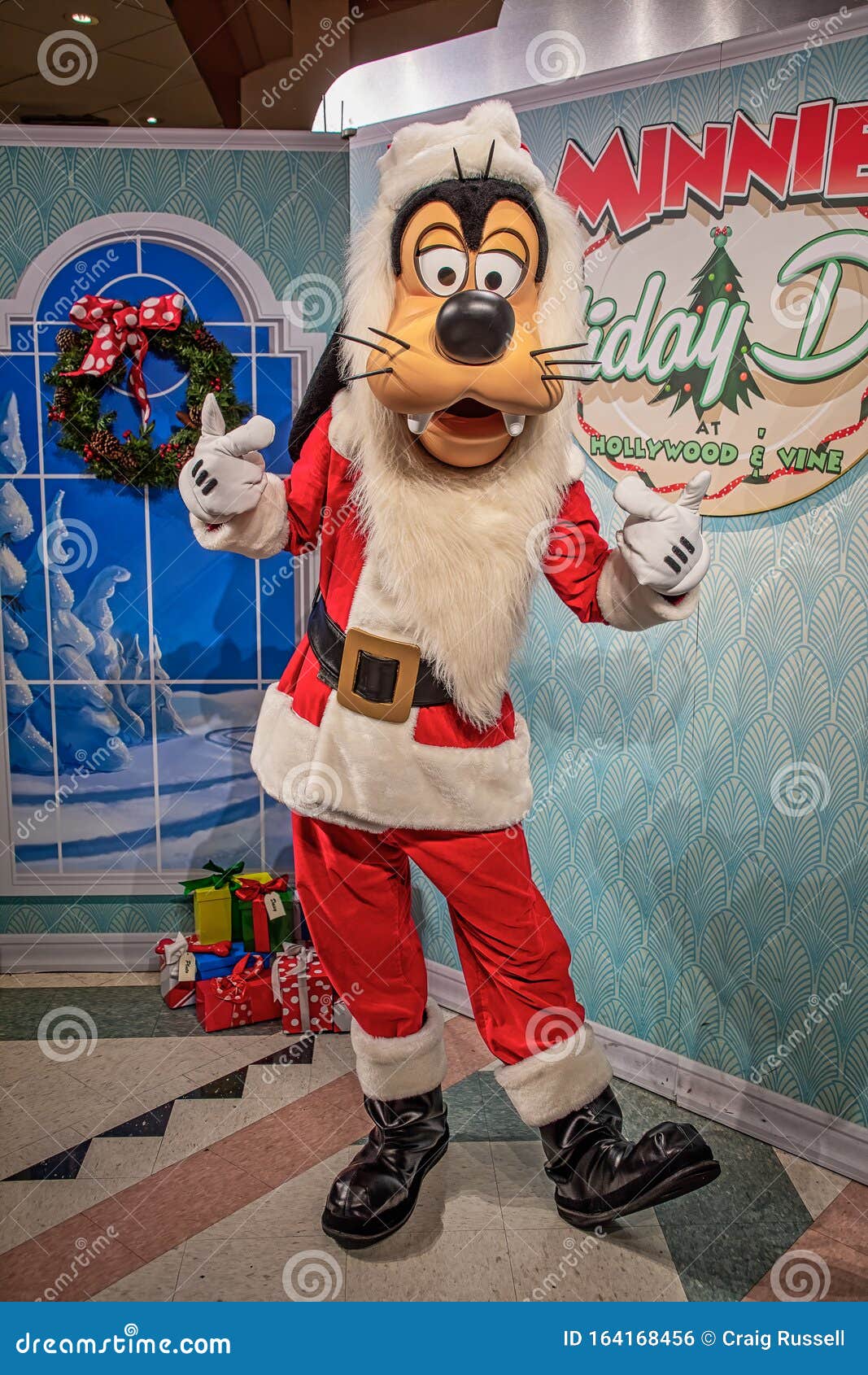 Goofy Character Dressed As Santa Editorial Photo - Image of nice, goofy ...