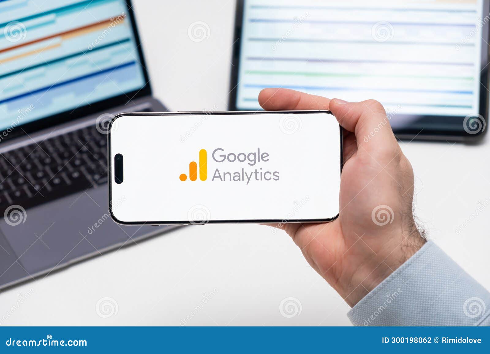 Google Analytics Logo on the Screen of a Smartphone in Mans Hand with ...