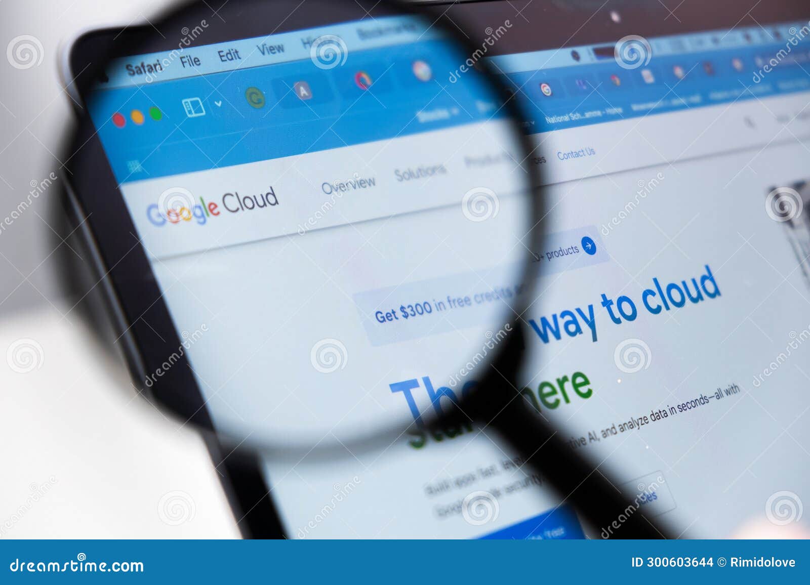 Google Cloud Logo on the Screen of Laptop through Magnifying Glass ...