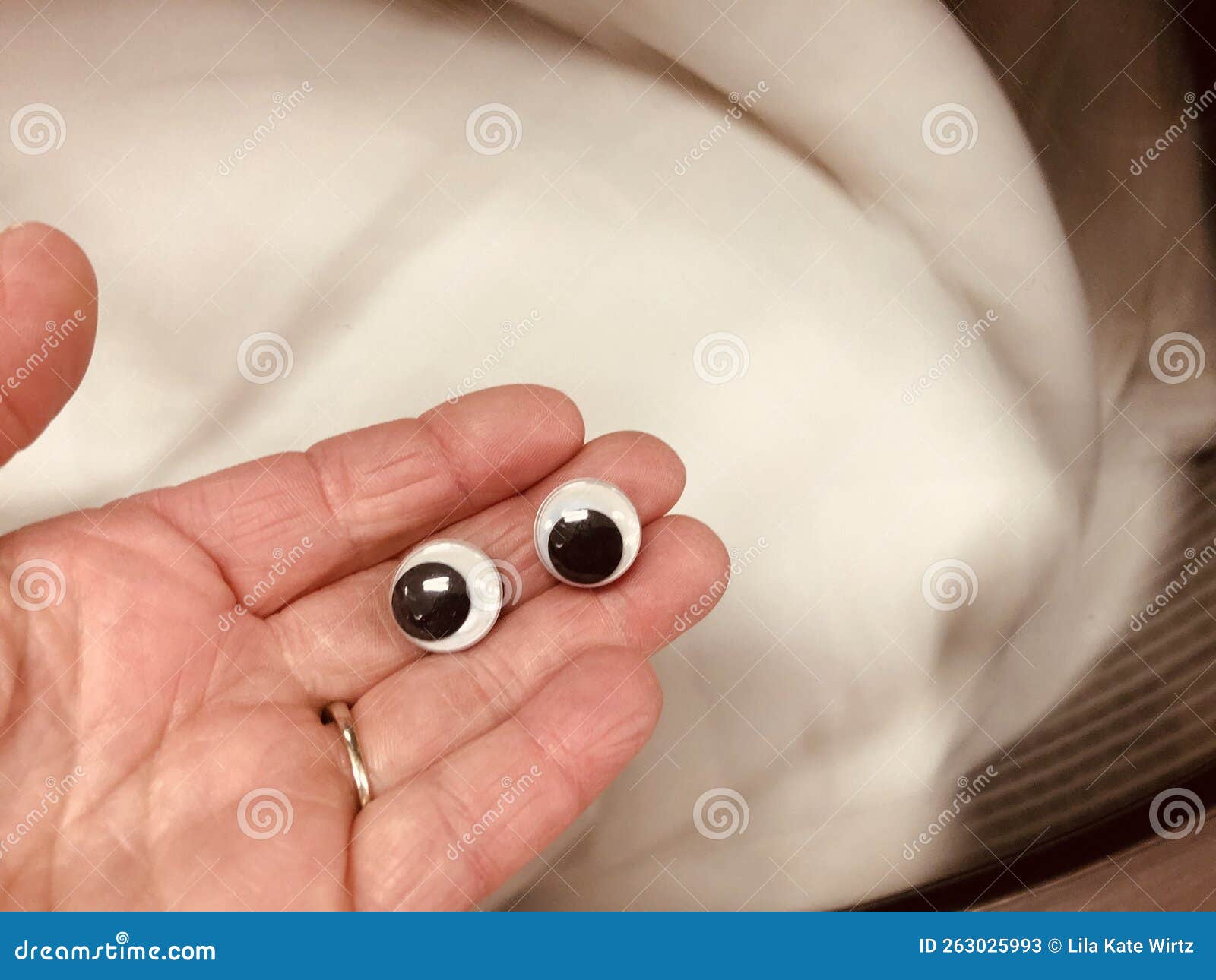 Google eyes in hand stock image. Image of watching, google - 263025993