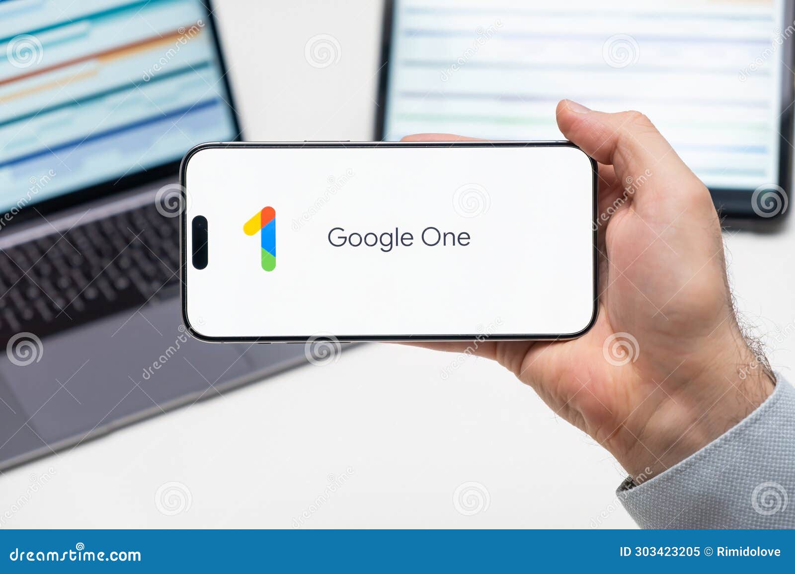 Google One Logo of App on the Screen of Mobile Phone Held by Man in ...