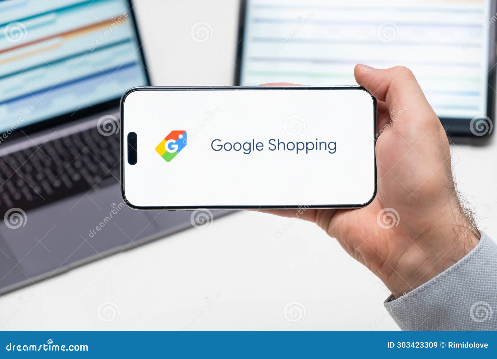 Google Shopping Logo of App on the Screen of Mobile Phone Held by Man ...