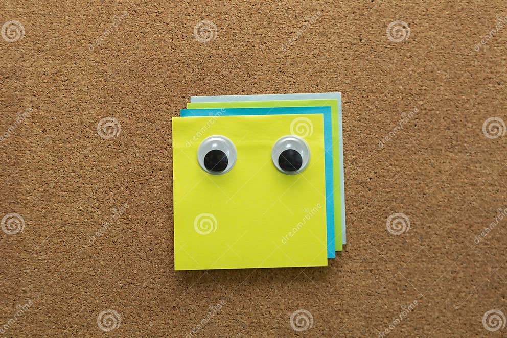 Googly Eyes on Clean Multiple Sticky Note on Cork Board Concept Using ...