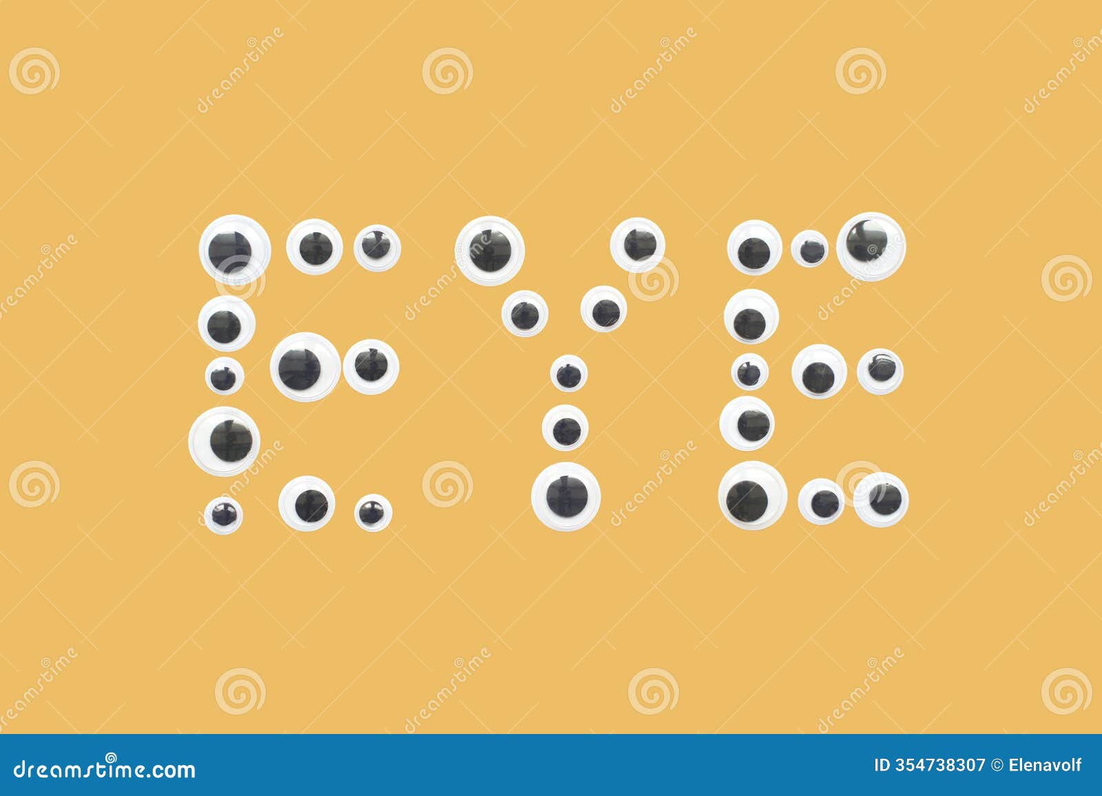 Googly Eyes Forming the Word Eye on a Yellow Background Stock ...