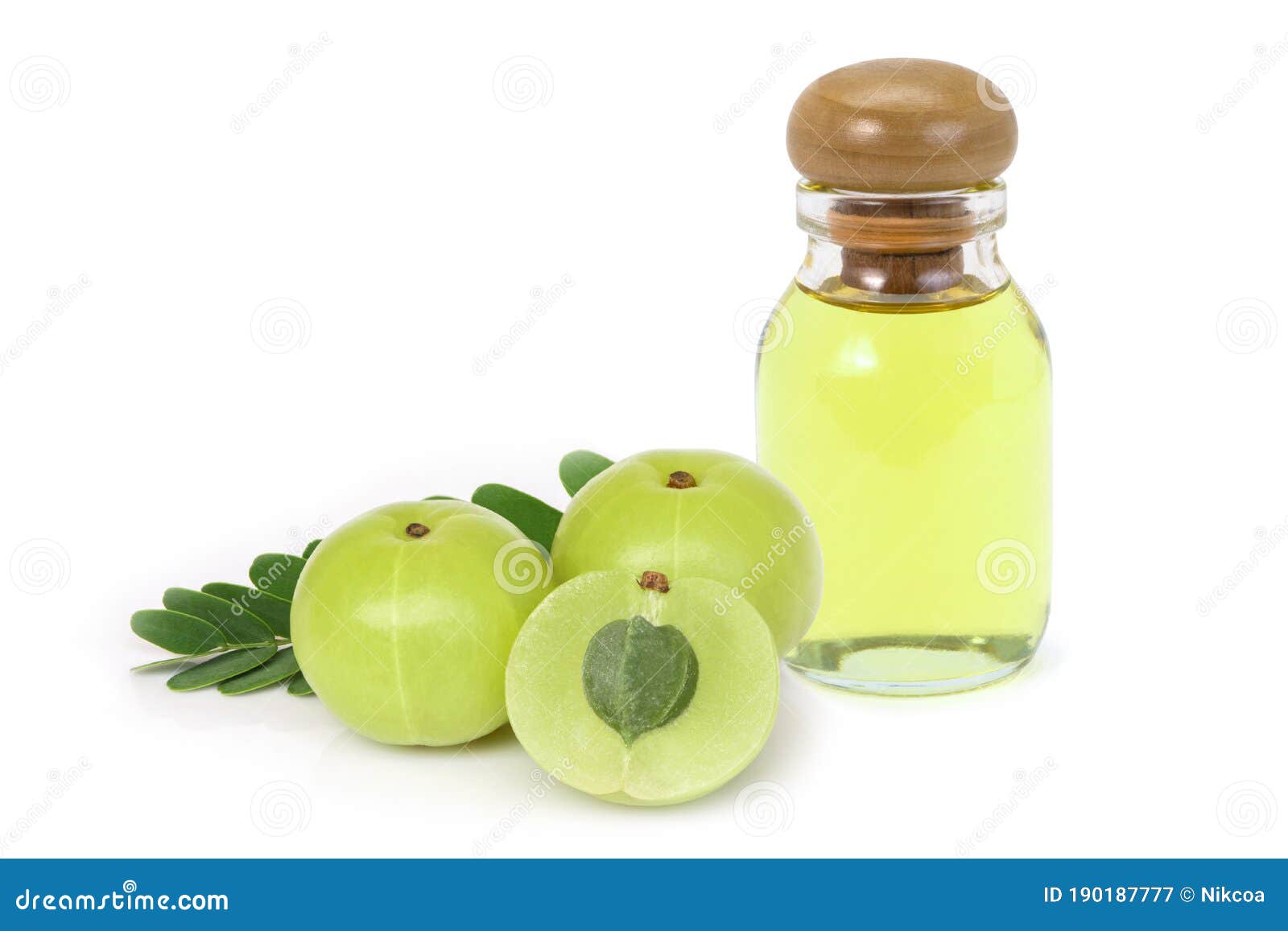 Amla Fruit or Indian Gooseberry with Green Leaf and Glass Bottle of ...
