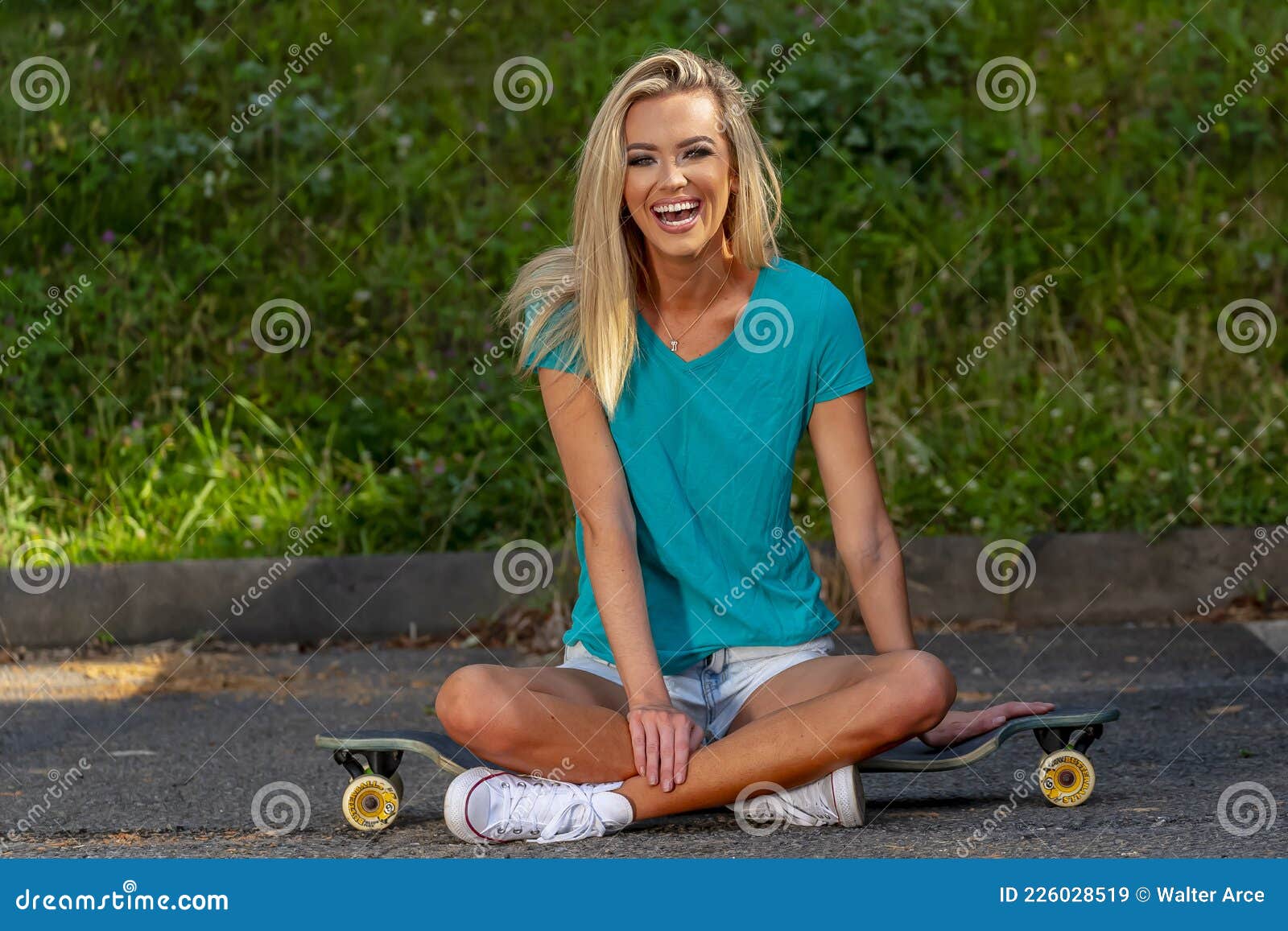 A Lovely Blonde Model Poses Outdoors In A Large City Environment Stock Image Image Of Feminine